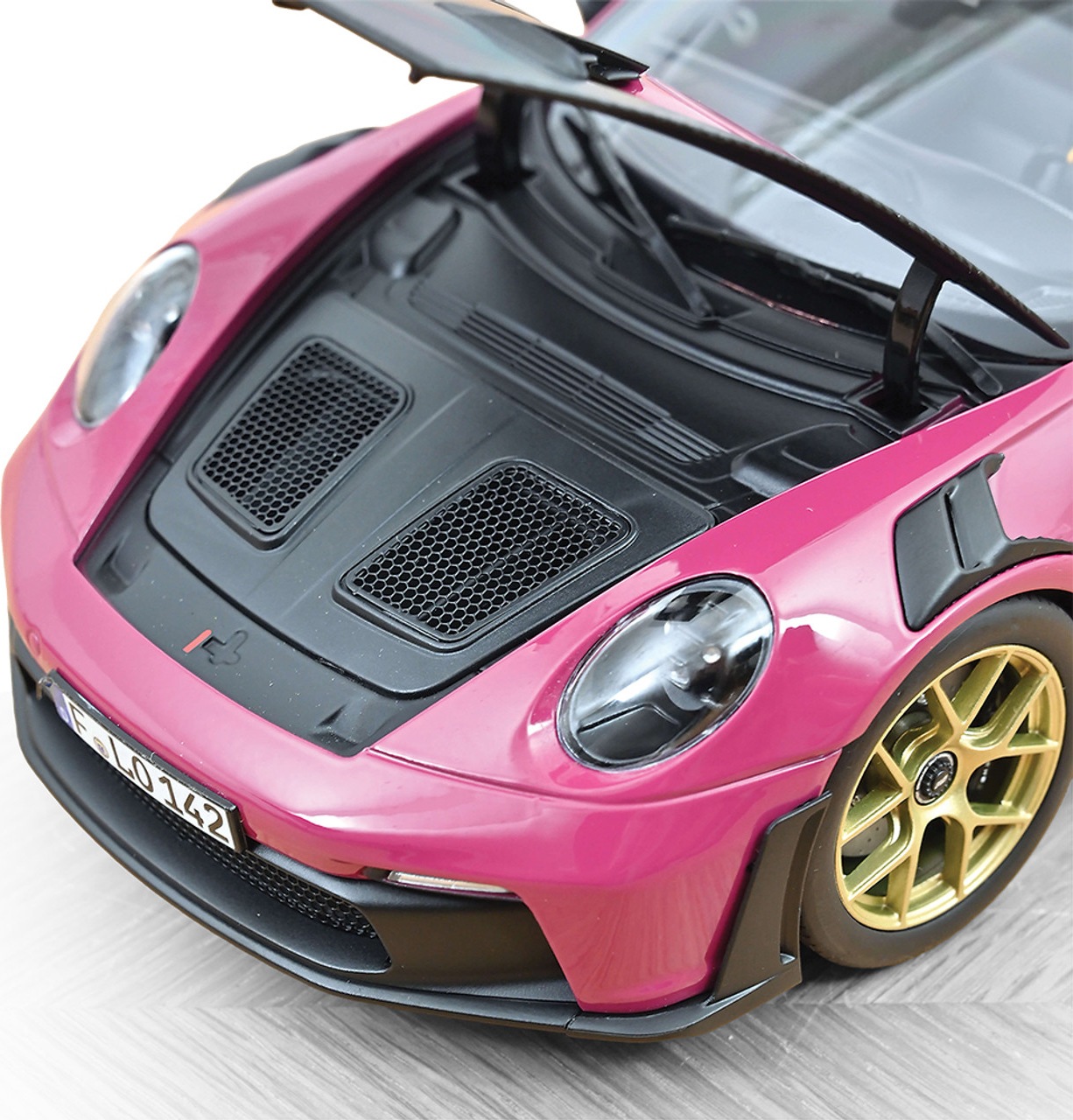 Porsche 911 GT3 RS w/Weissach Package Ruby Star in 1:18 scale by Norev