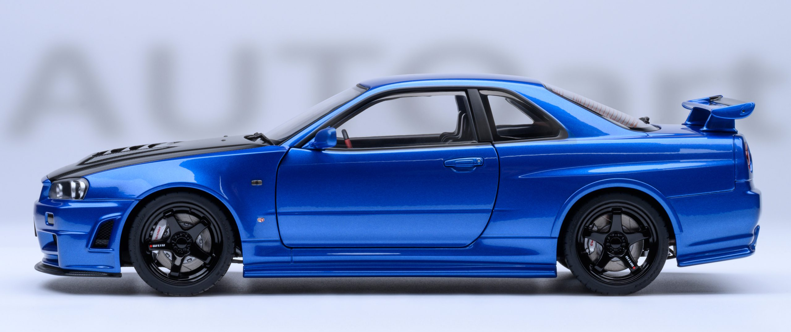 Nismo R34 GT-R Z-tune, Bayside Blue w/Carbon Bonnet in 1:18 scale by ...