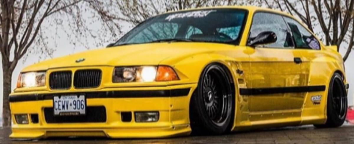 1990 BMW M3 Coupe Pandem Sun Yellow in 1:18 scale by Solido