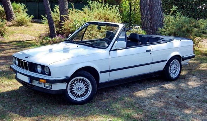 BMW 325i Cabriolet 1991 Alpine white in 1:18 scale by Norev